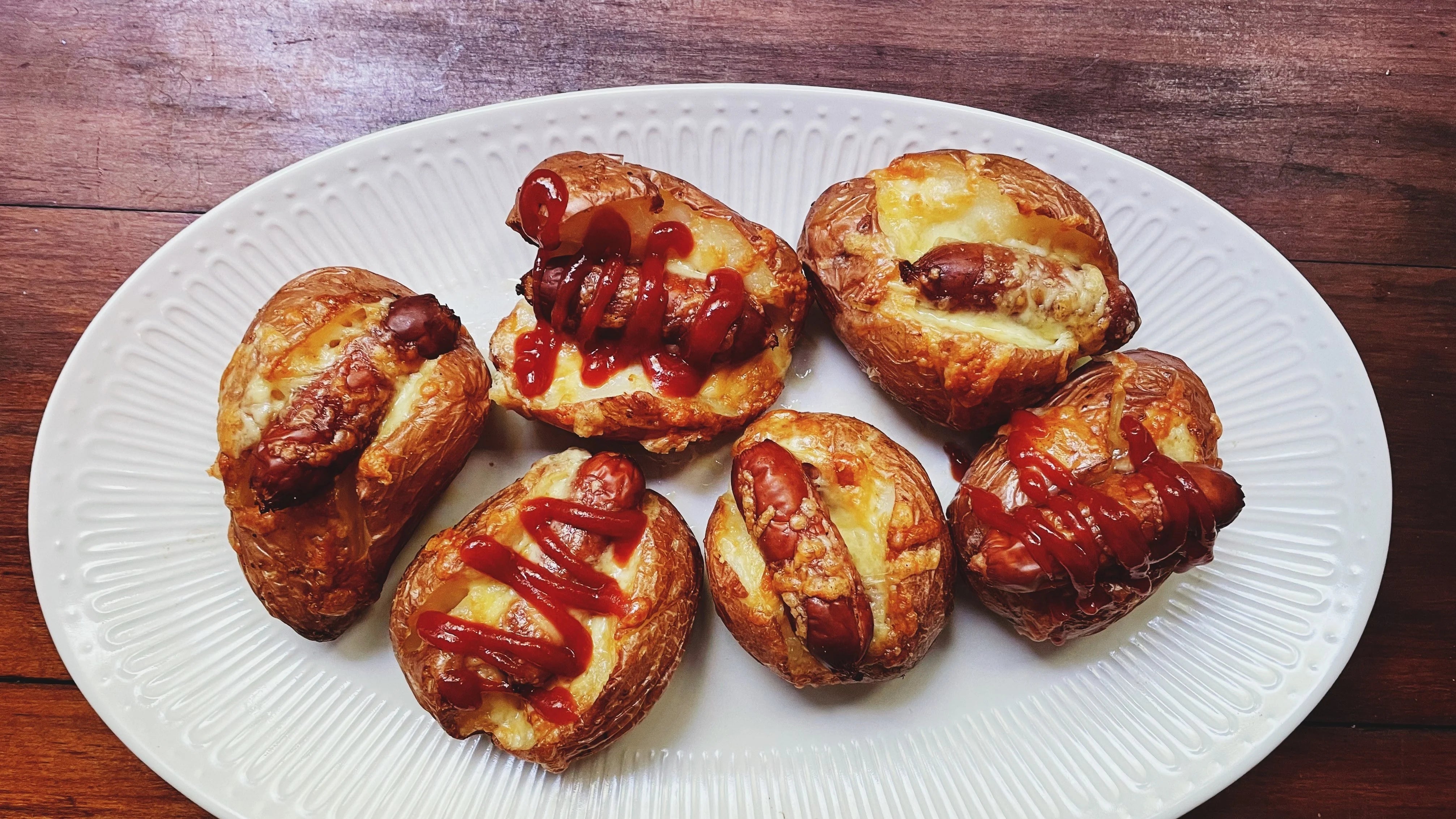 Mini Cheesy Cheese Kransky Baked Potatoes – Gotzinger Smallgoods